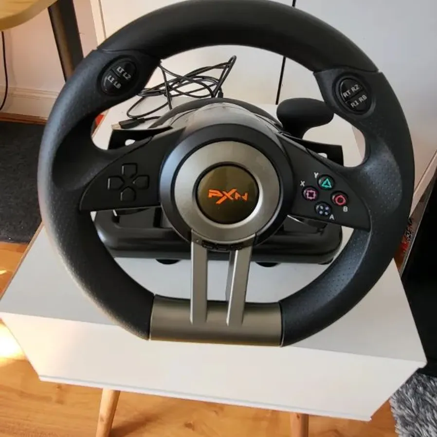 Grab the Wheel and Take Control! PXN V3 PRO - Your Next Level Racing ...